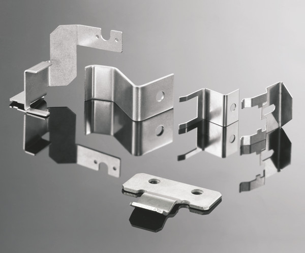 Stanz- und Umformtechnik › Gutekunst Formfedern GmbH › Abkanten ...